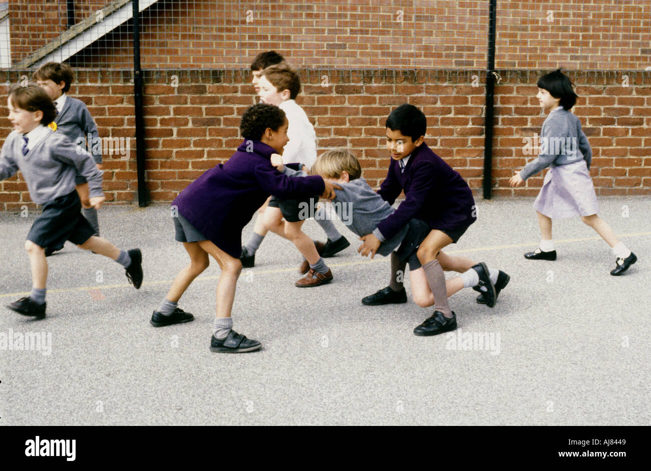 primary school children playing in yard London private school Stock ...