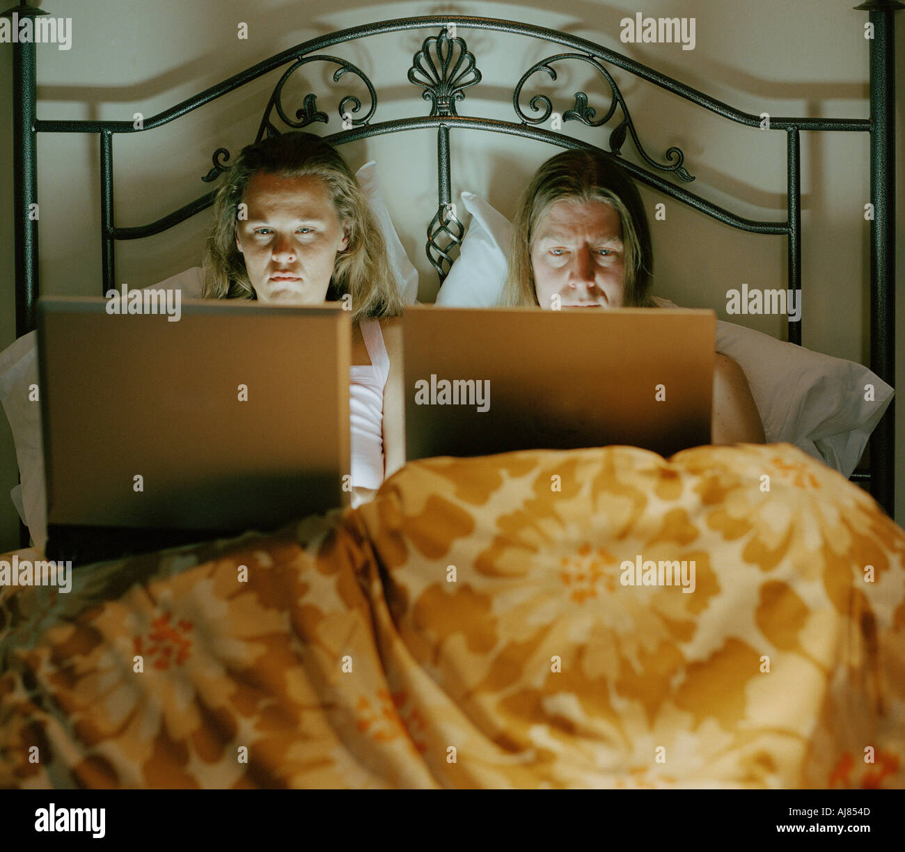 Workaholic couple hi-res stock photography and images - Alamy