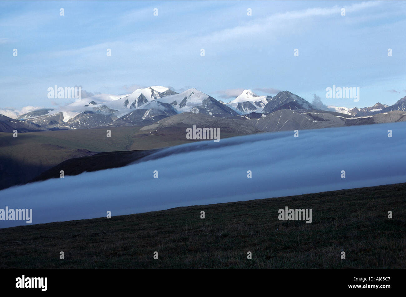 Fog and midnight sun in the Brooks Range, Alaska Stock Photo - Alamy