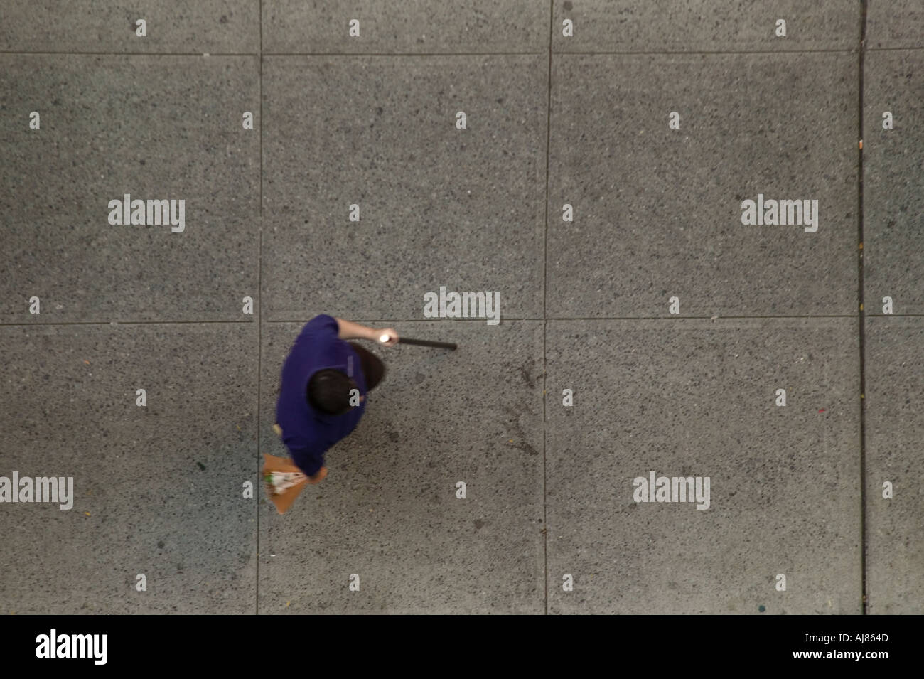 Overhead view from hotel room of person walking on sidewalk Midtown ...