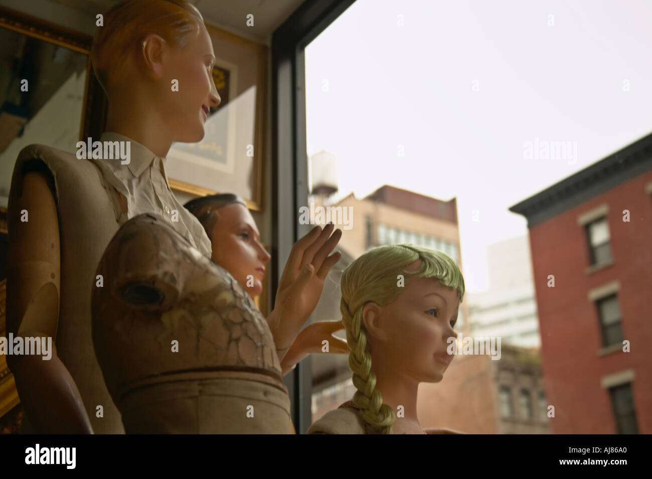 1930's vintage mannequins made of plaster and fabric in shop window on ...