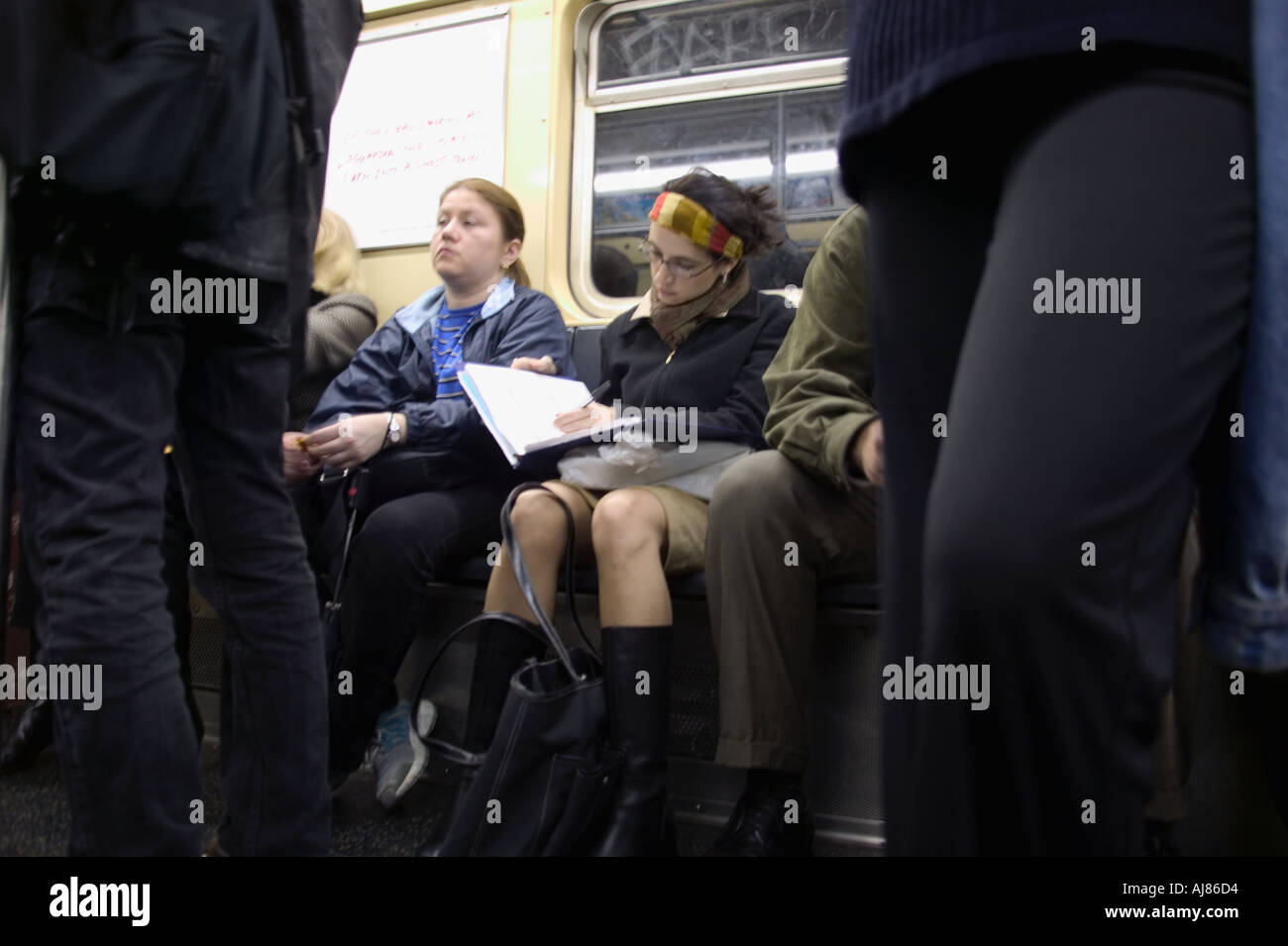 Riding new york subway hi-res stock photography and images - Alamy