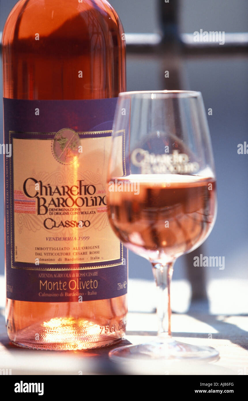 Glass and bottle of Bardolino Wine rose wine Bardolino Lake Garda ...