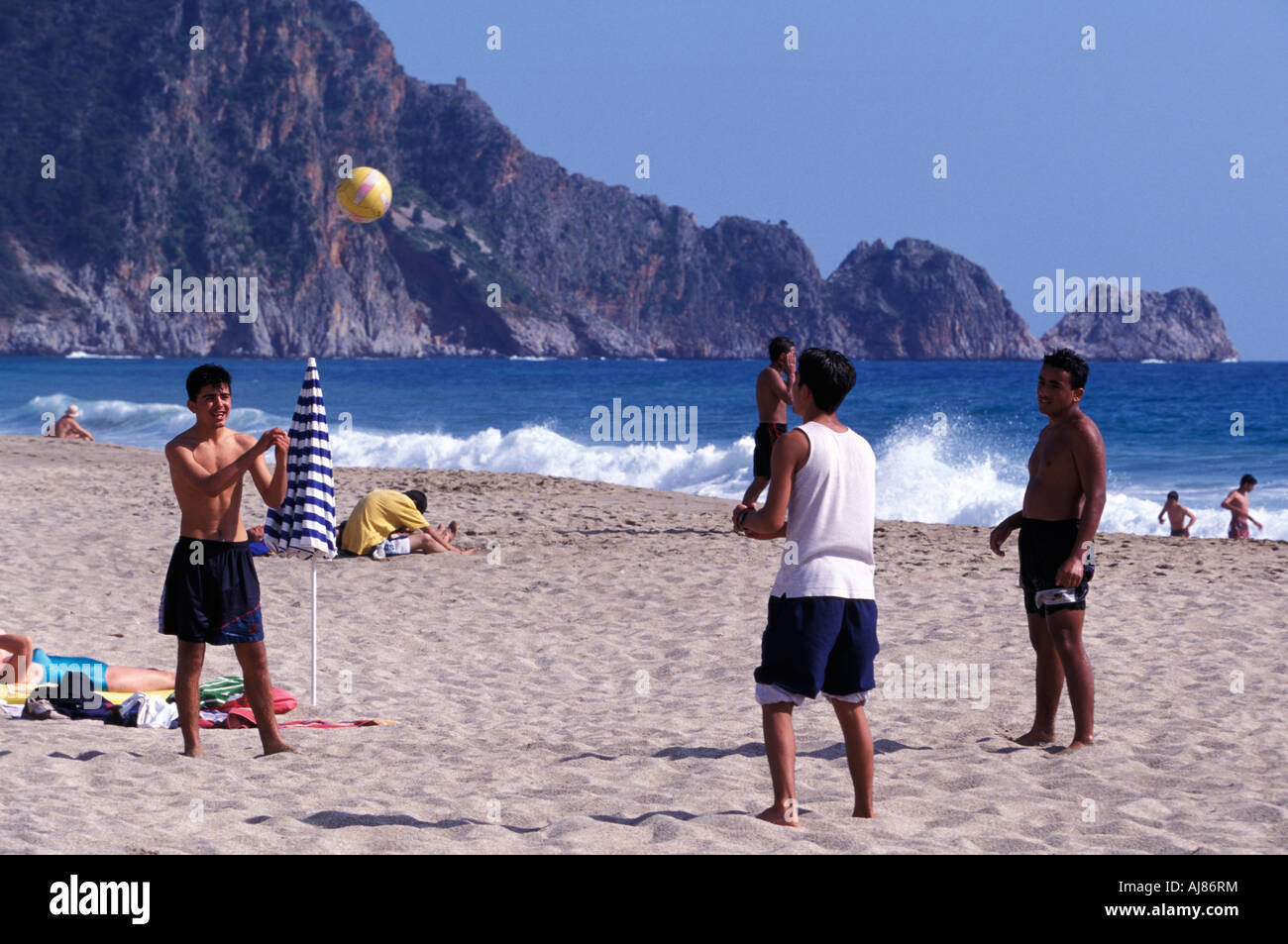 Young turkish men playing volleyball at beach Antalya Antalya Turkish ...