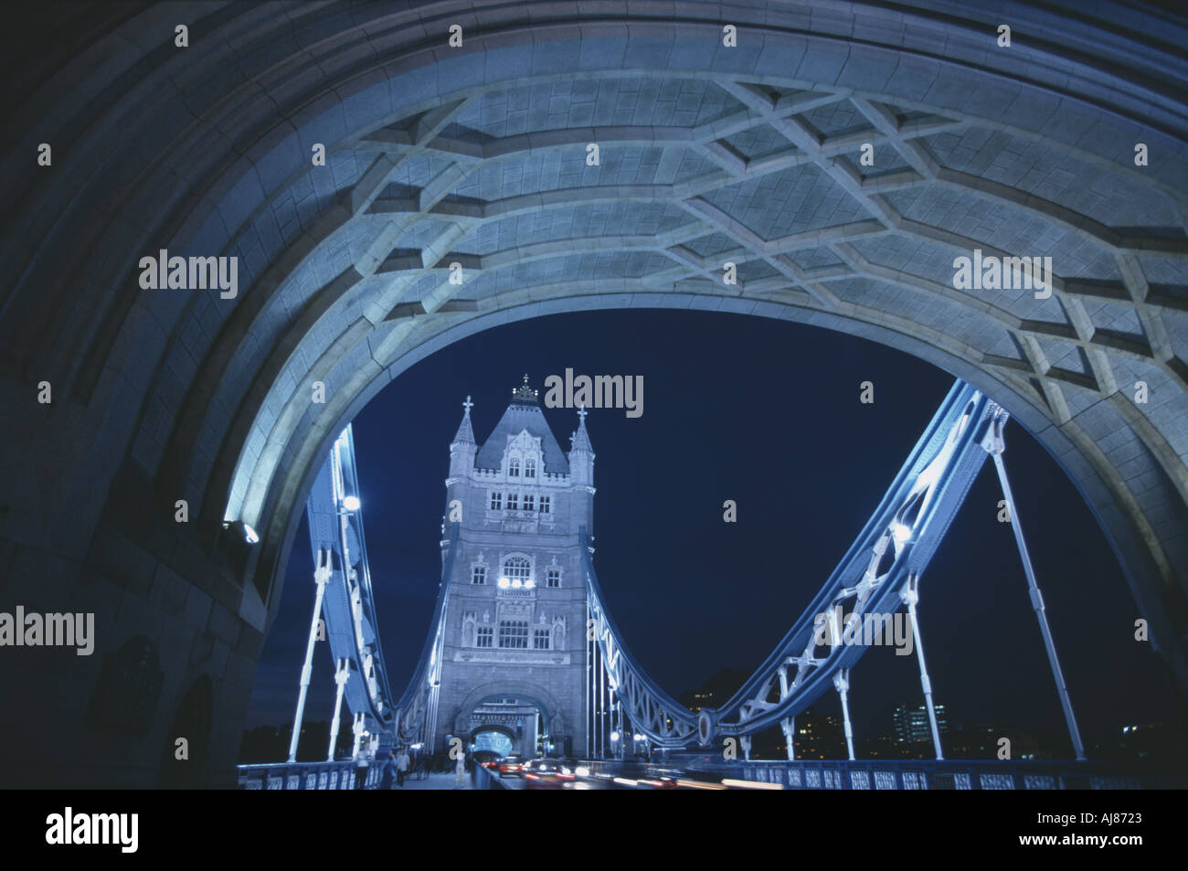 View through Tower Bridge archway at night London England Stock Photo ...