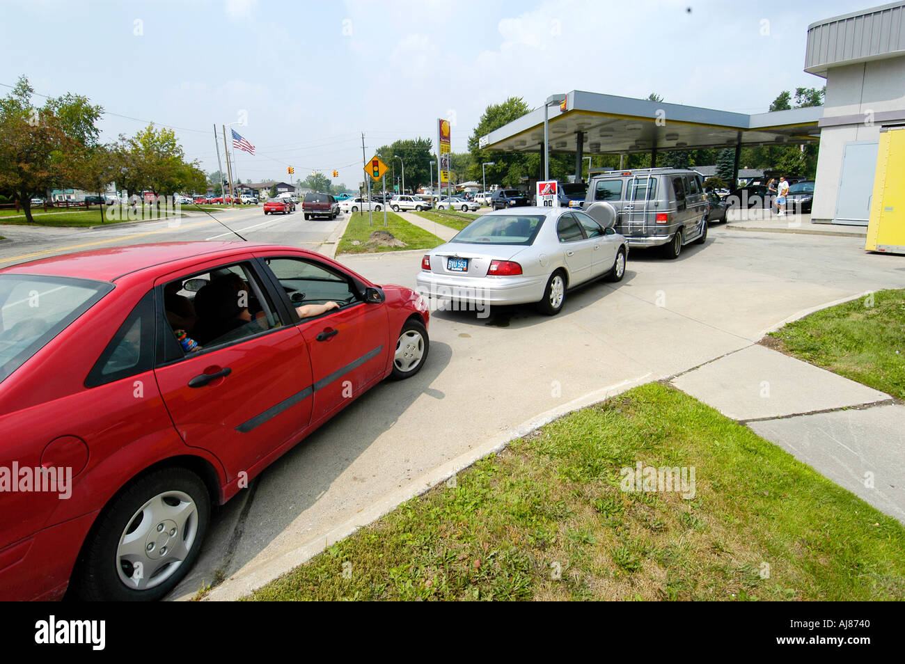 Long Lines Form At Gas Station because of high prices and shortages of gasoline Stock Photo - Alamy