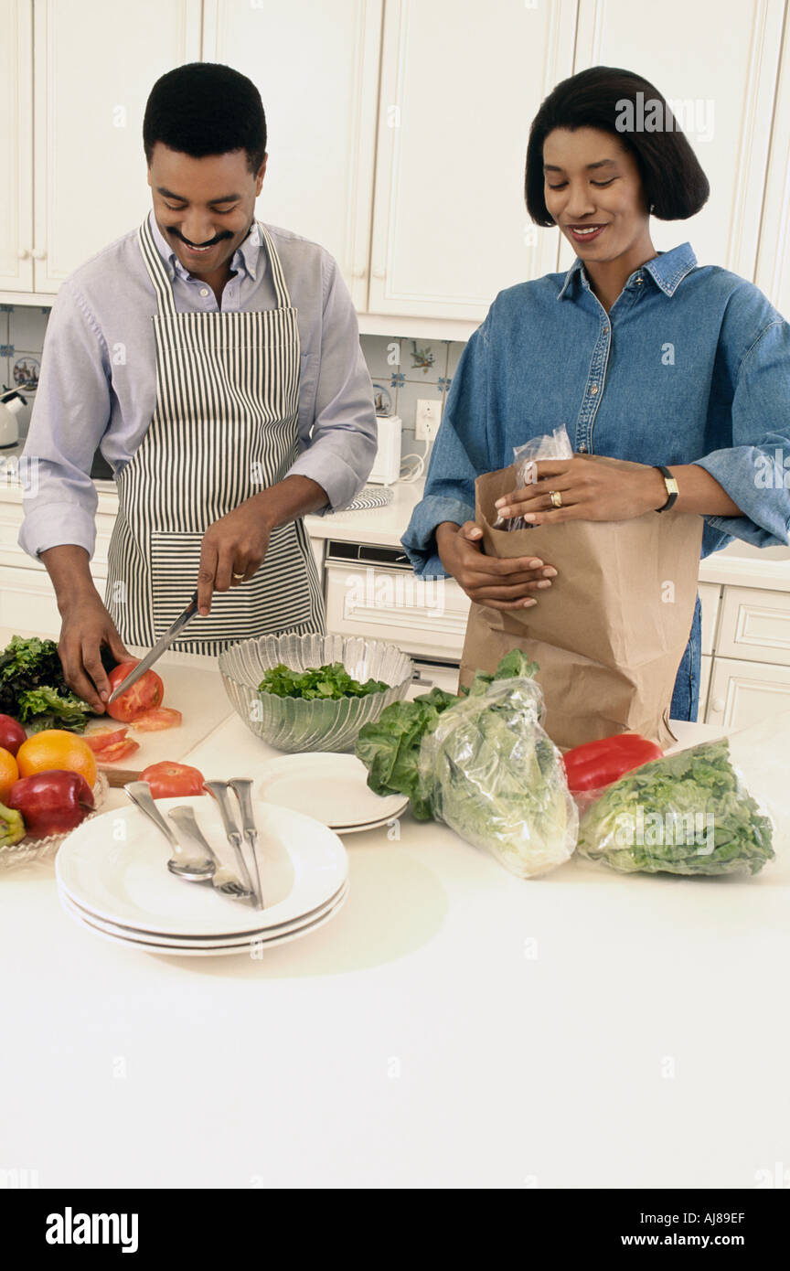 African American couple cooking at home Stock Photo - Alamy