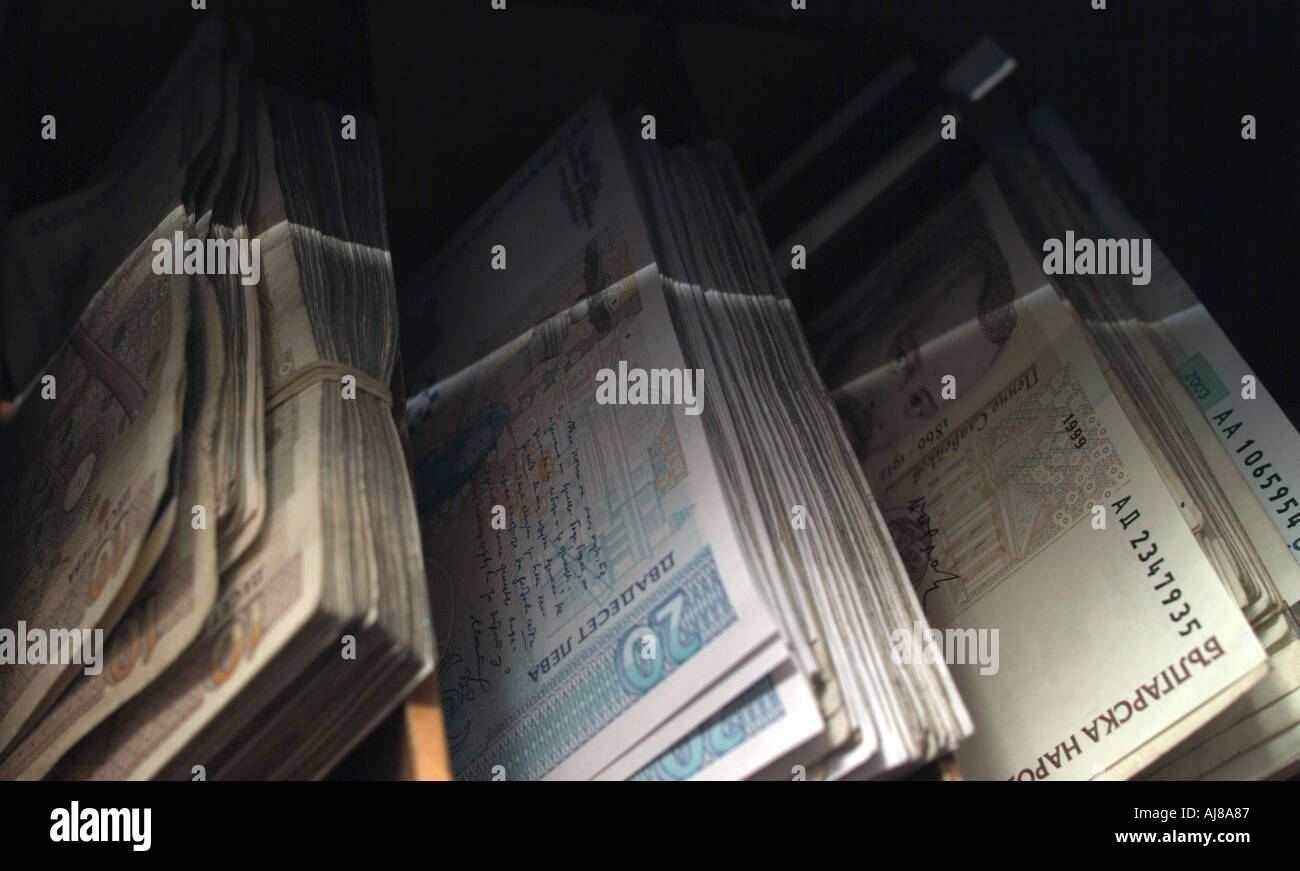 piles of money in the drawer Stock Photo - Alamy