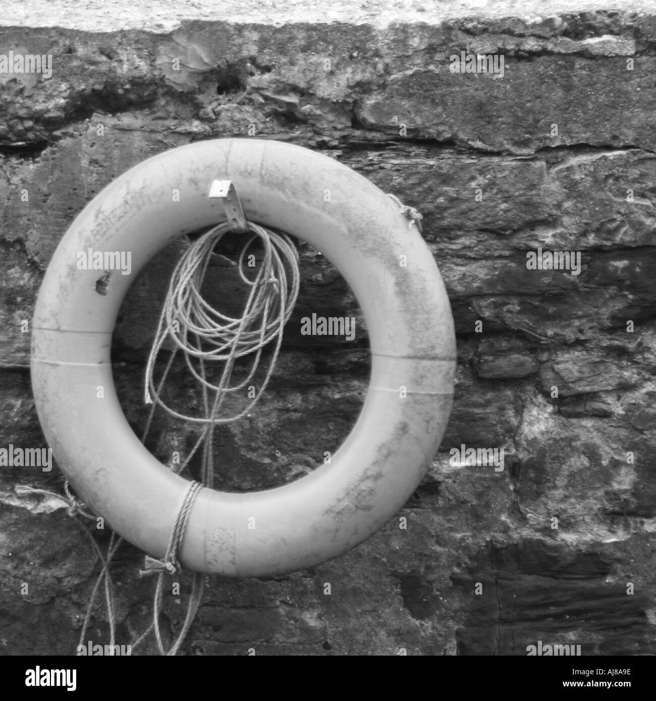 Life ring on wall Stock Photo - Alamy