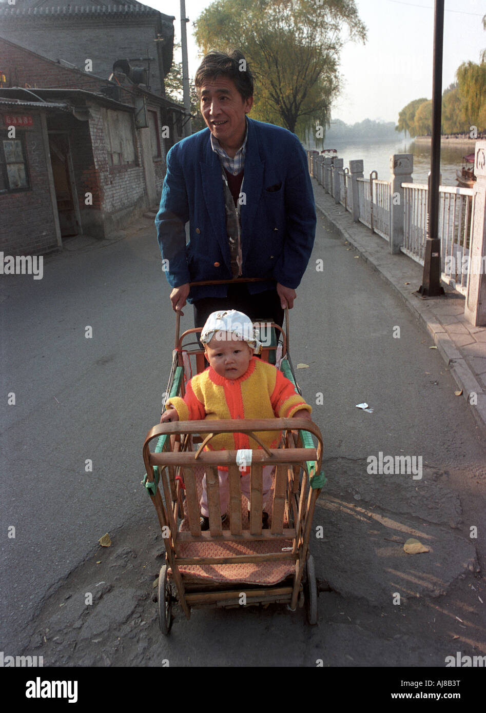 Father with his son in Suzchou, China Stock Photo - Alamy
