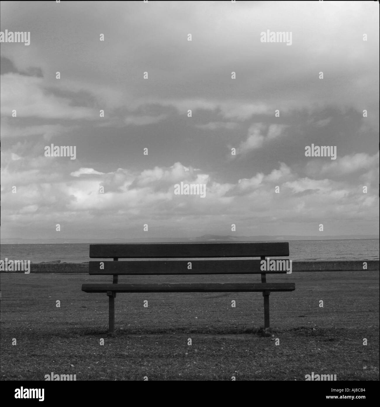 Bench by seaside Stock Photo - Alamy