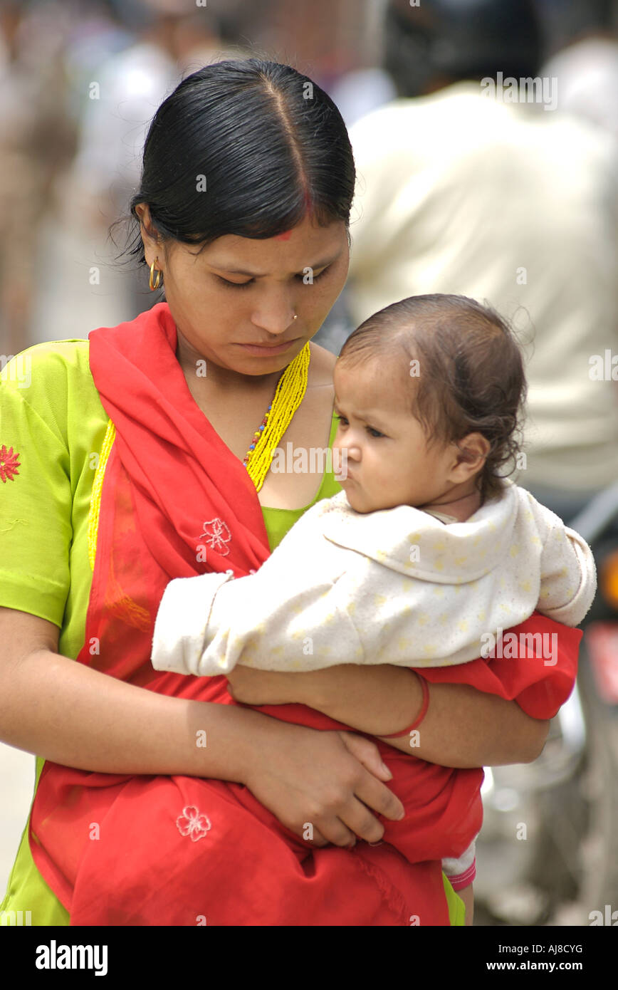 Nepalese mother carying her baby Kathmandu Nepal Stock Photo - Alamy