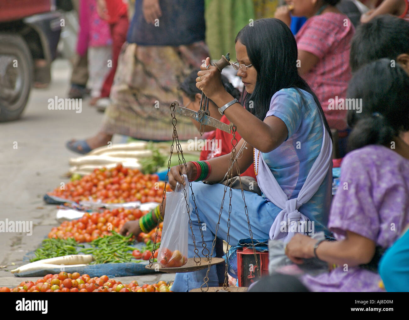 Vegetable vendor weighing vegetables selling hi-res stock photography and images - Alamy
