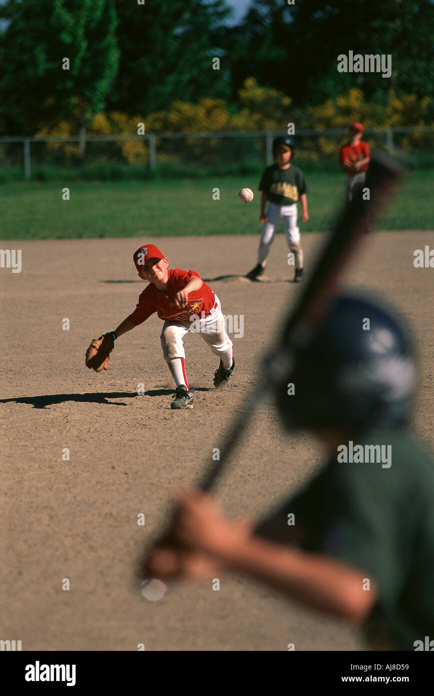 Boys Little League baseball game Stock Photo - Alamy