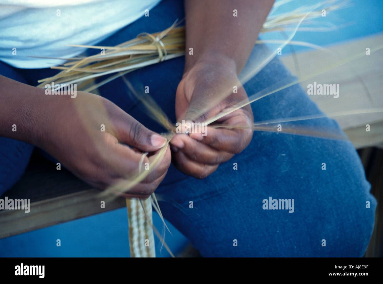 Hands Straw basket weaving Bahamas Cat Island Stock Photo - Alamy