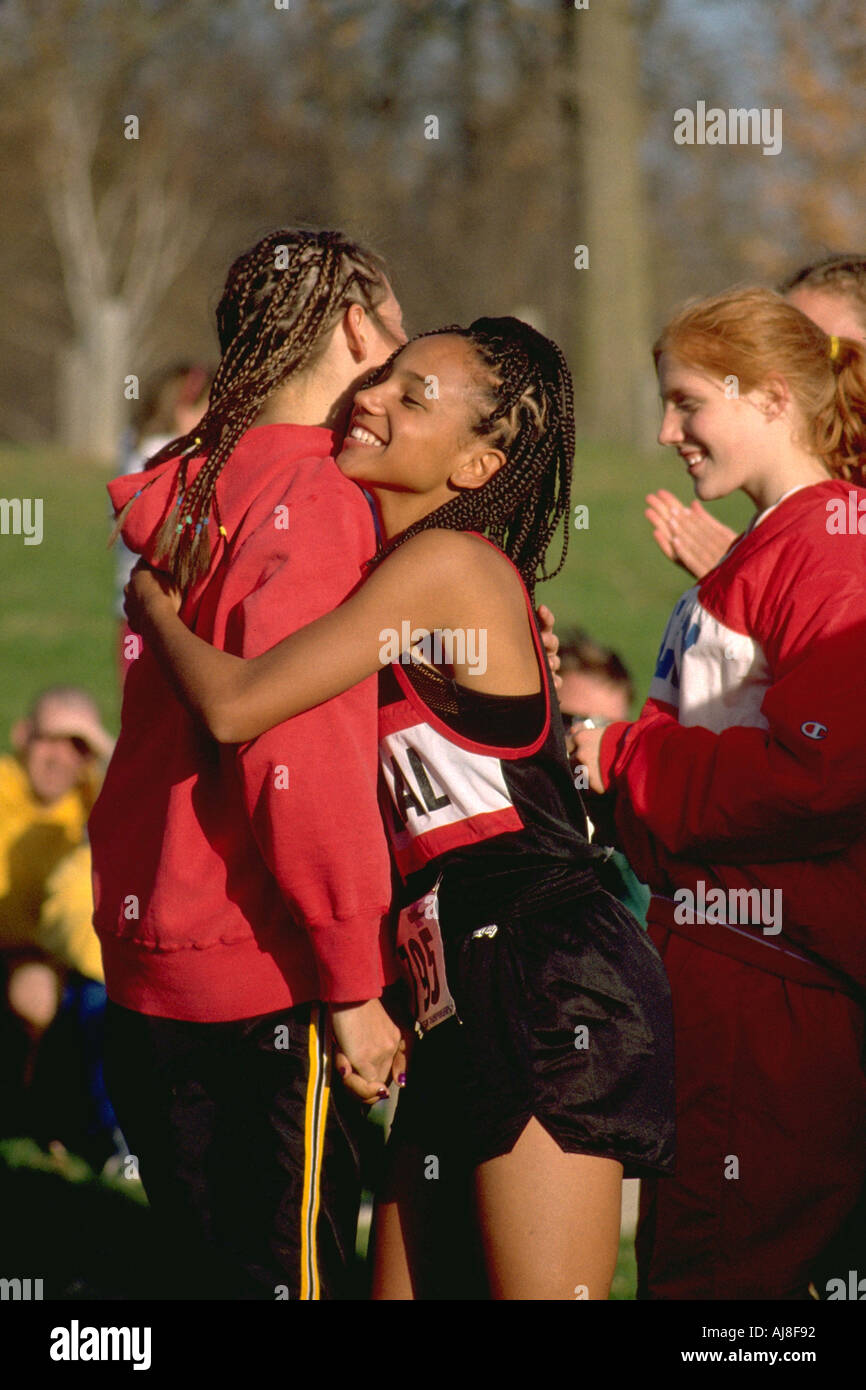 Female athletes hugging hi-res stock photography and images - Alamy