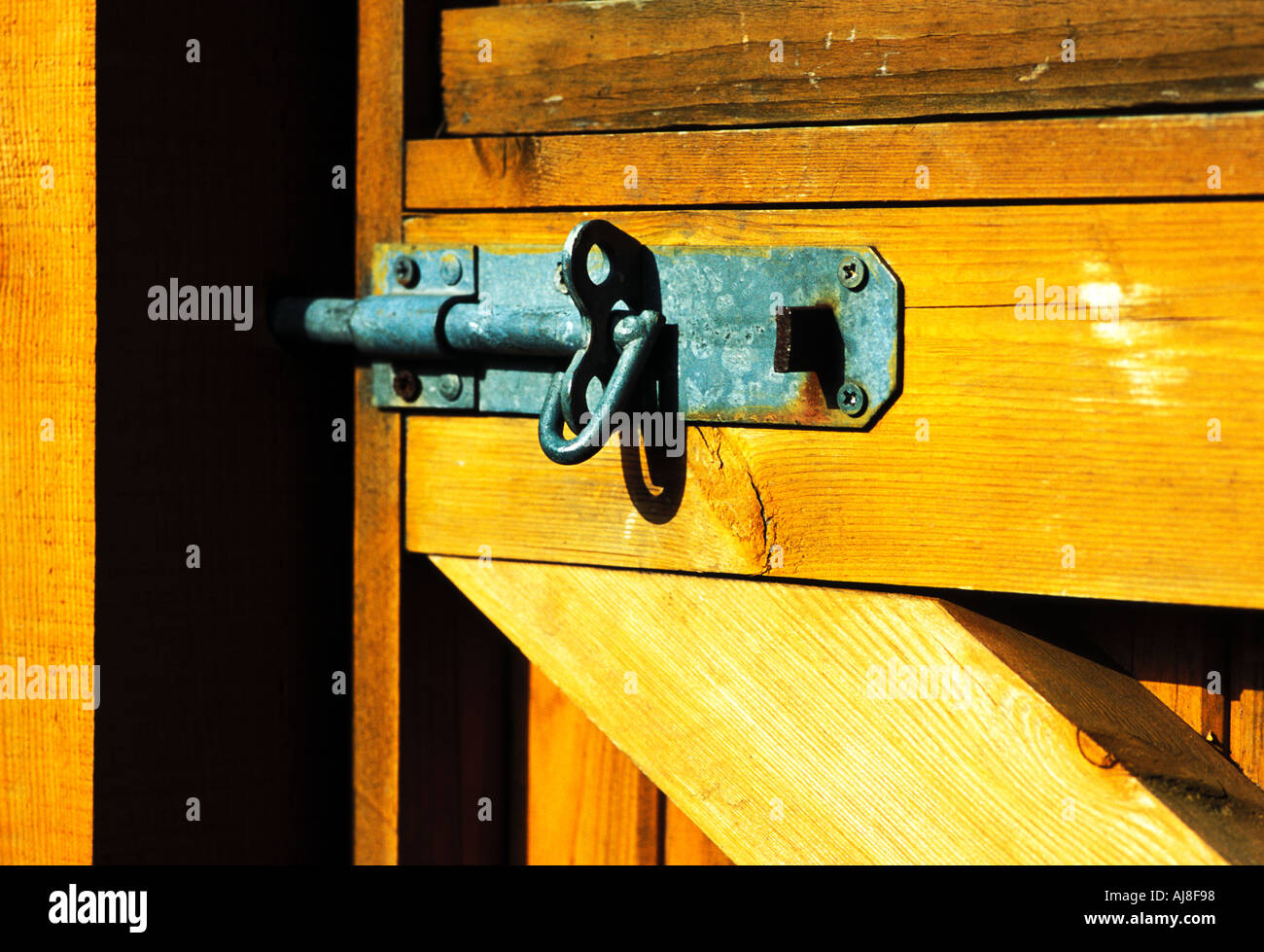 Bolt and latch on wooden gate Stock Photo - Alamy