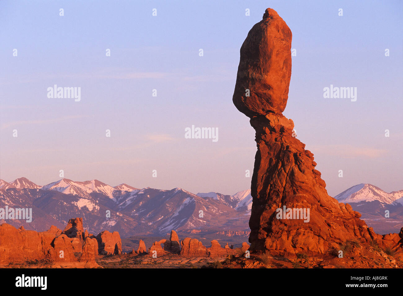 USA Utah Arches National Park Setting sun lights red sandstone of ...