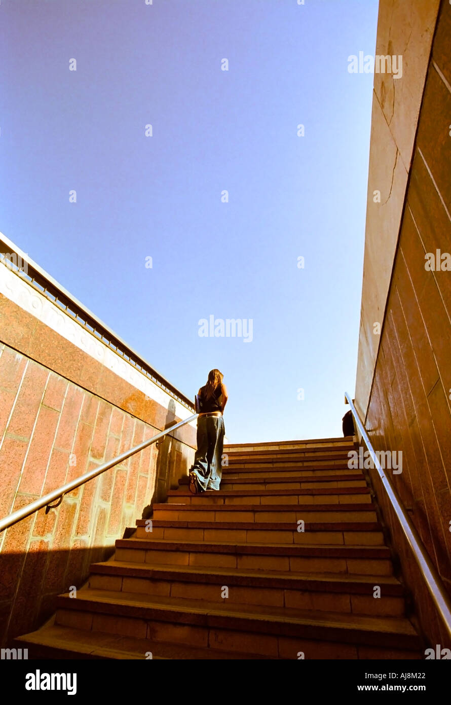 Girl climbing stairs, Barcelona, Spain Stock Photo - Alamy