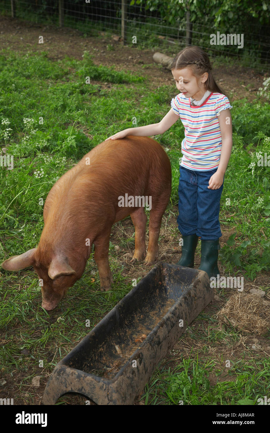 Girl pig trough hi-res stock photography and images - Alamy