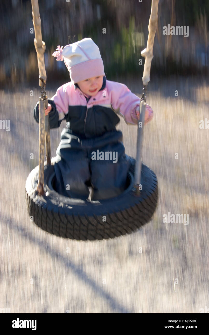 Girl three years old playing on the playground Stock Photo - Alamy