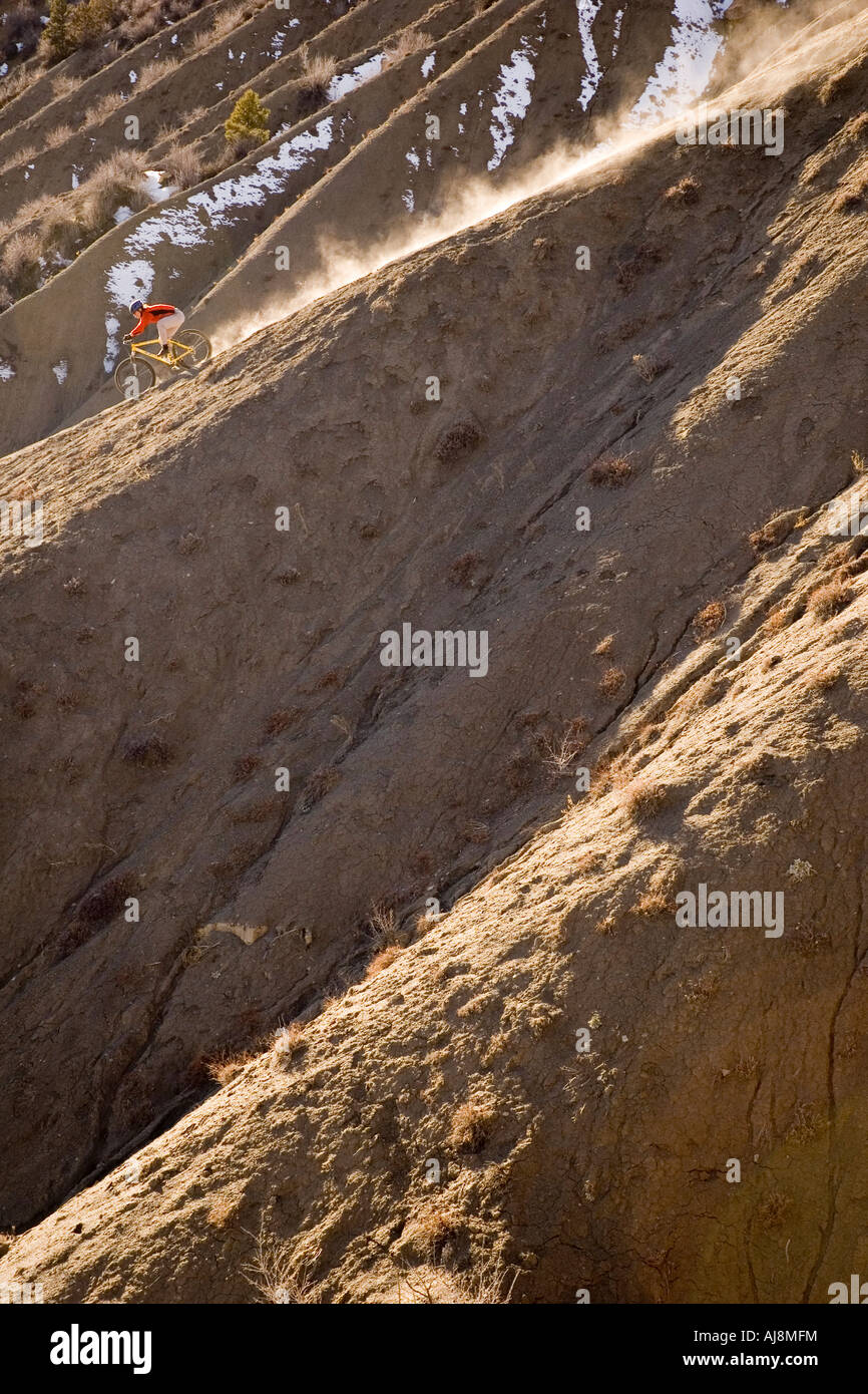 Mountain biking down steep trail Stock Photo - Alamy