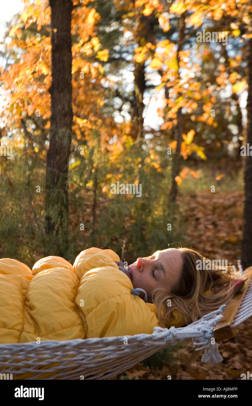 Woman sleeping in hammock Stock Photo - Alamy