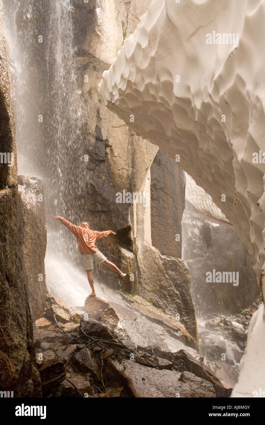 Man under waterfall hi-res stock photography and images - Alamy