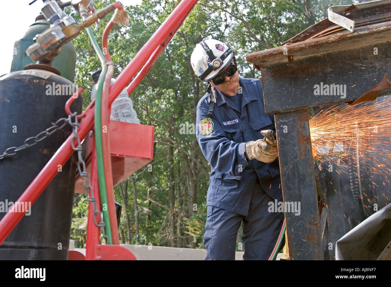 Emergency Responder Practices Cutting Through Steel Stock Photo - Alamy