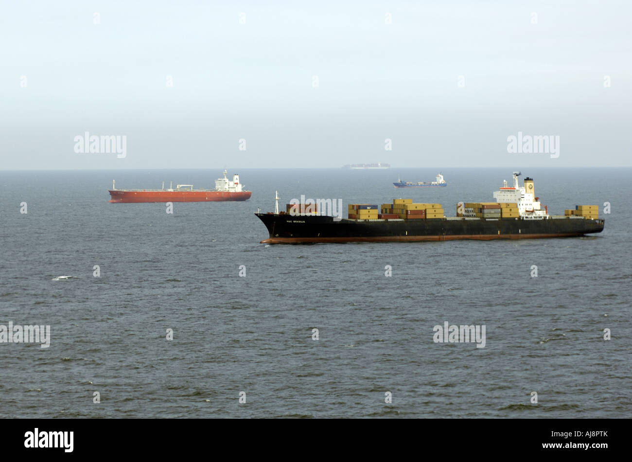 Aerial view of a container ship on the North sea off the Dutch coast ...