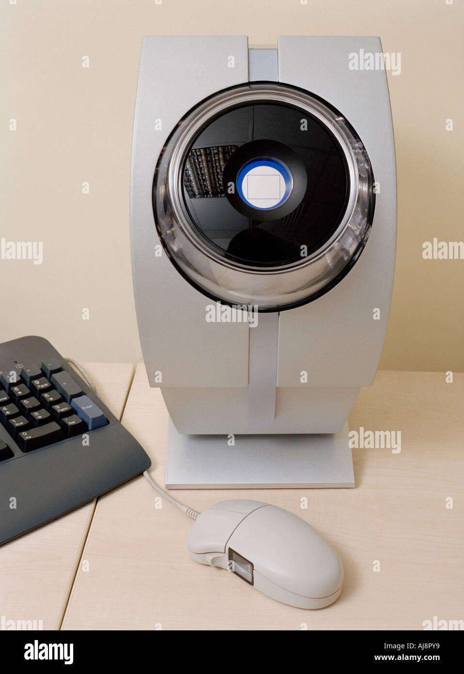 Retinal scan identification system on office desk Stock Photo - Alamy