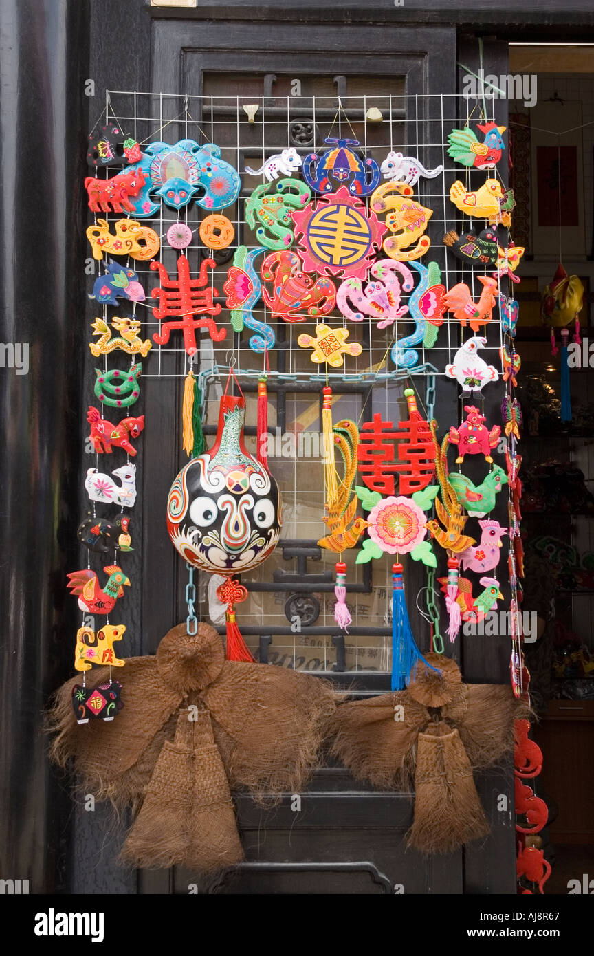 Hangings and decorations at chinese flea market Stock Photo - Alamy