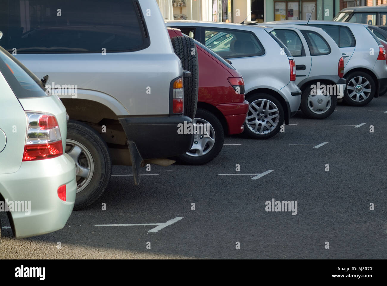 Cars parked in parking bays Stock Photo - Alamy