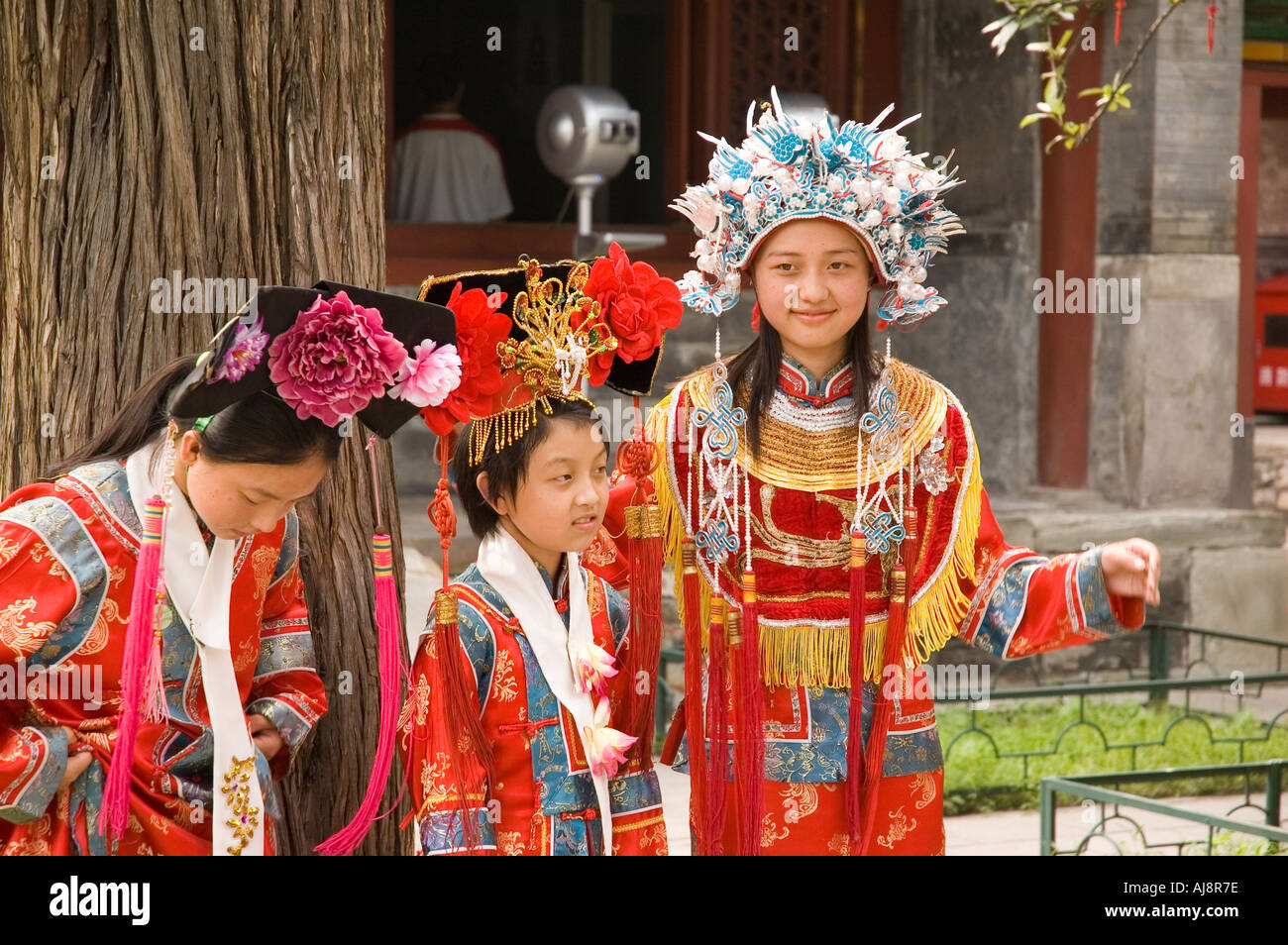 Chinese girls wearing traditional costumes Stock Photo - Alamy