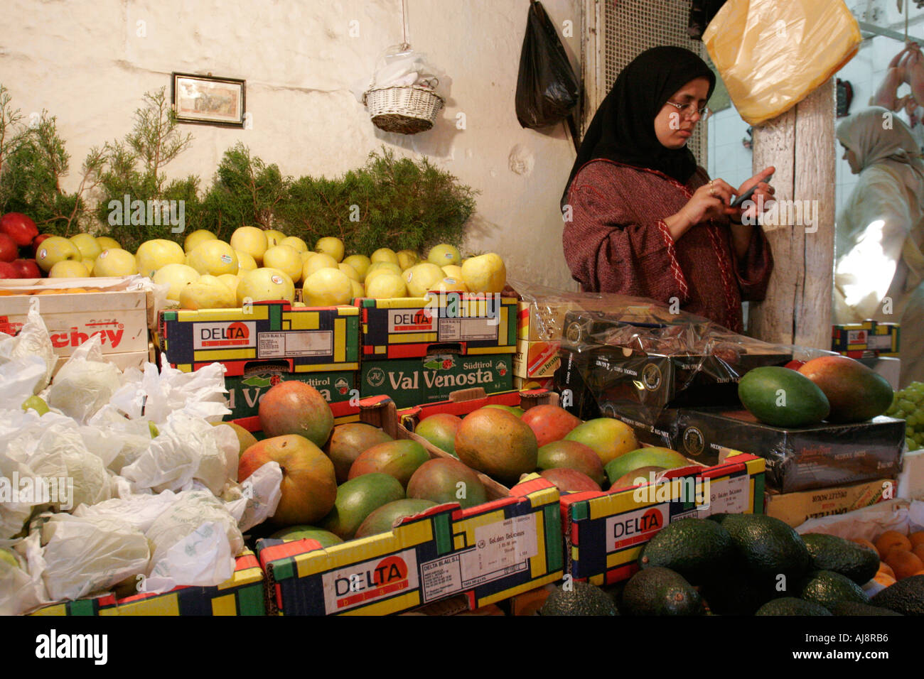 Moroccan woman in Tangier Market Stock Photo - Alamy