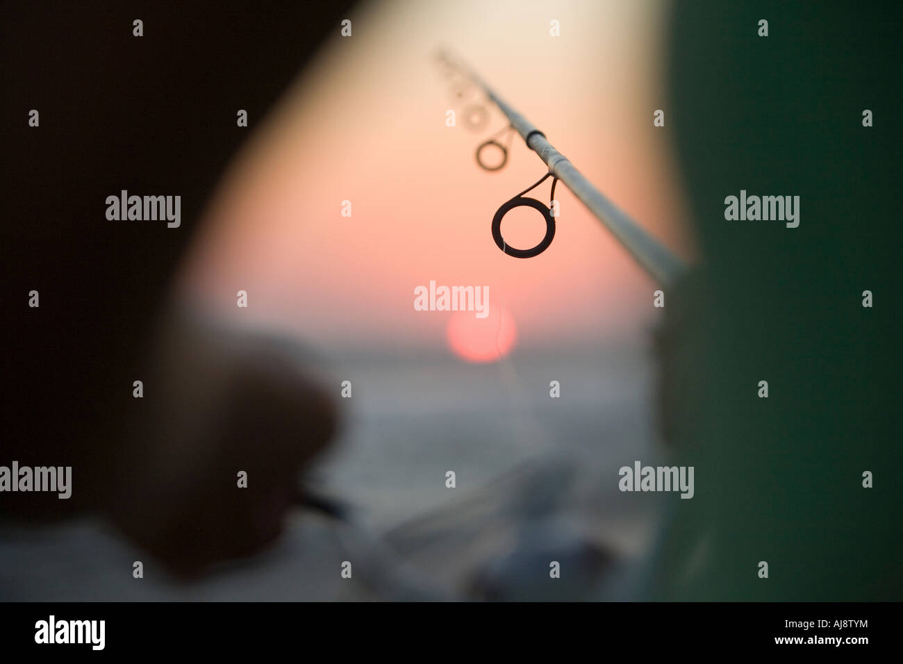 Fishing on beach at sunset Mexico Stock Photo - Alamy