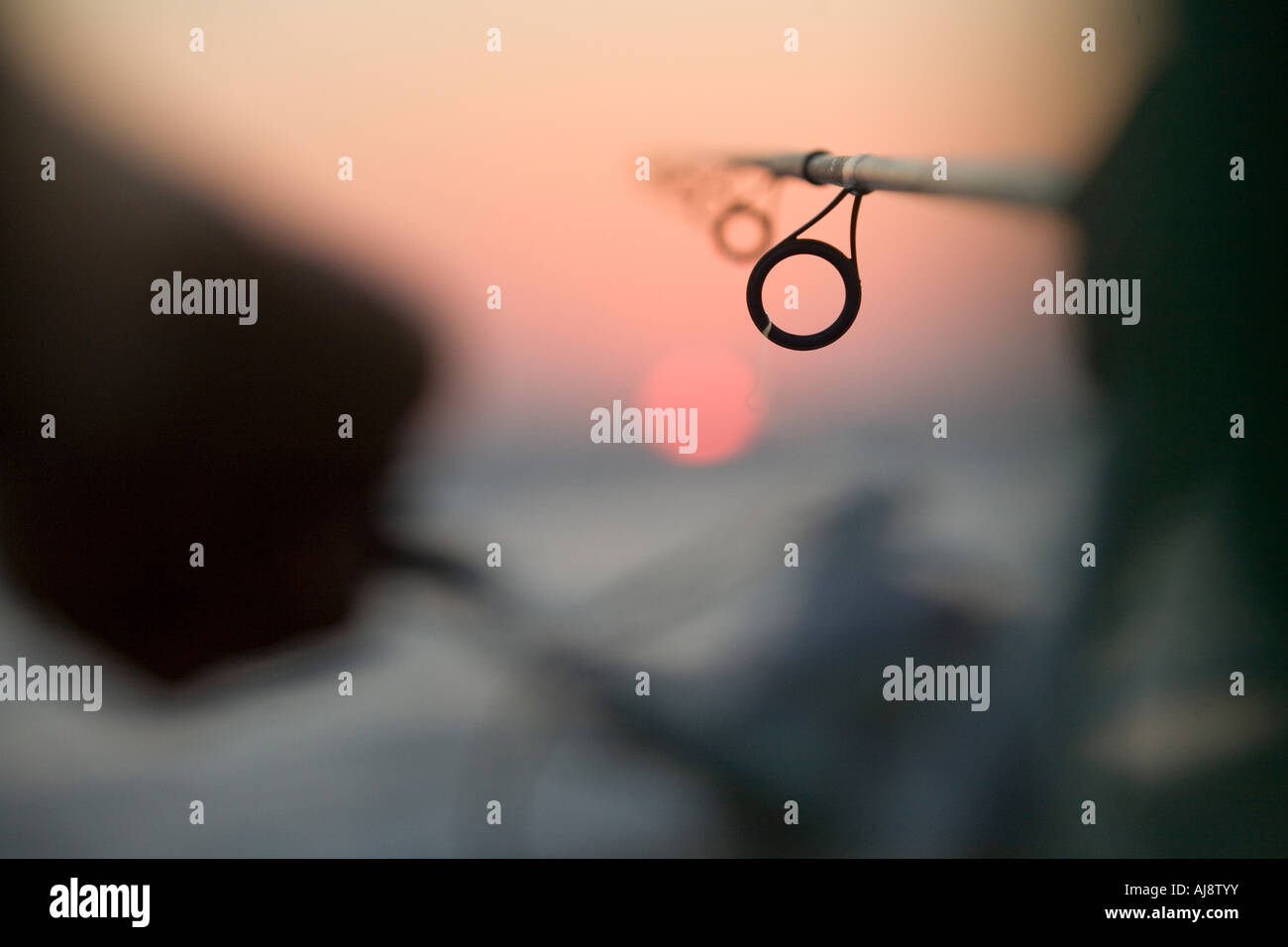 Fishing on beach at sunset Mexico Stock Photo - Alamy