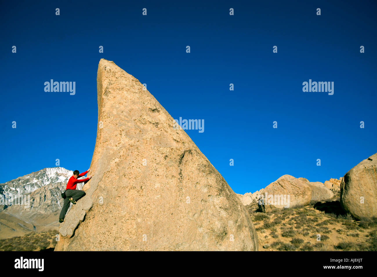 Male climber bouldering Stock Photo - Alamy