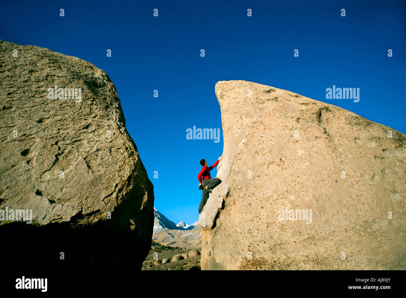 Male climber bouldering Stock Photo - Alamy