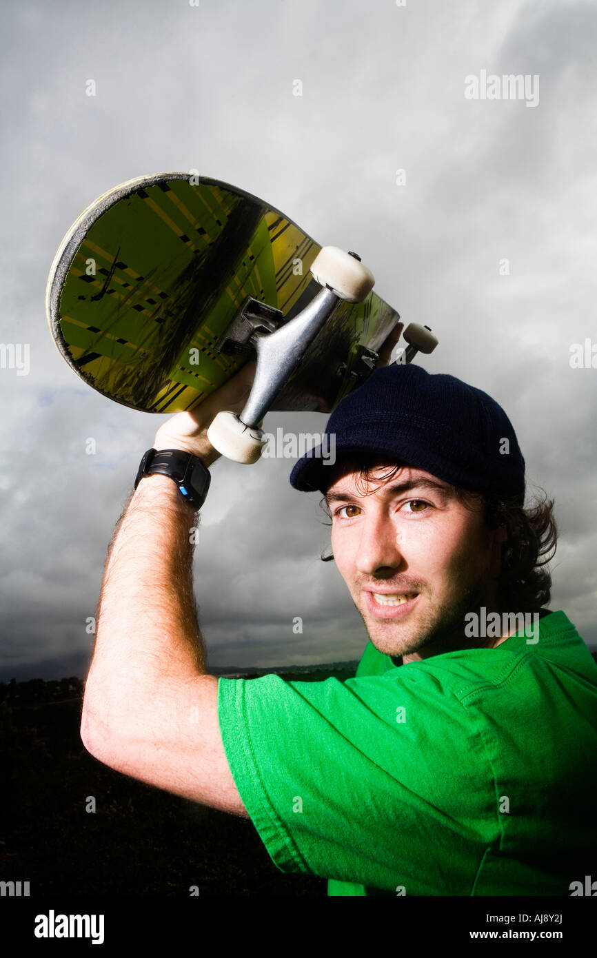 A skateboarder attacking the camera with his board Stock Photo - Alamy