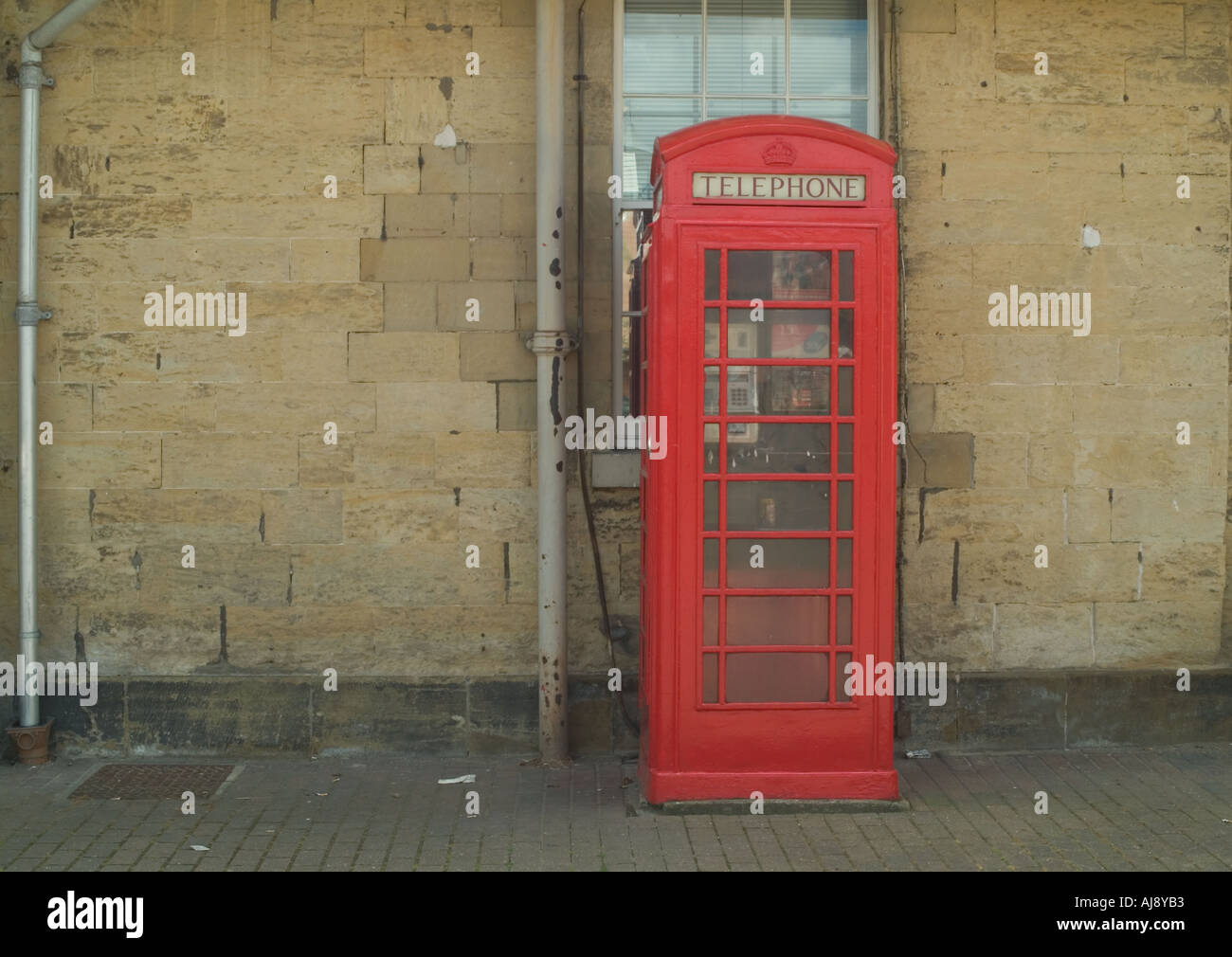 Traditional English telephone box outside the station at Malton North ...