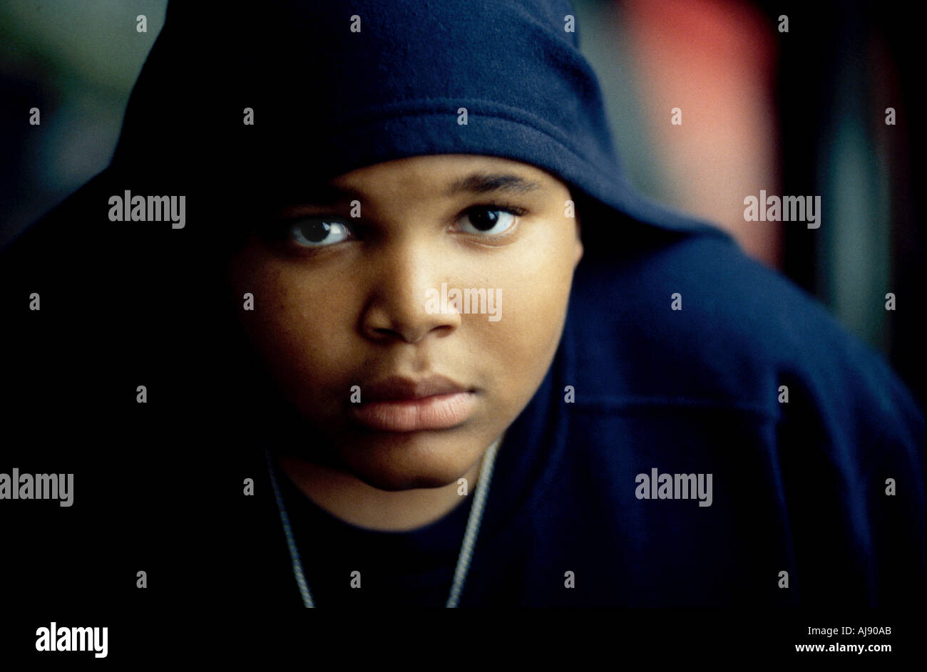 Gang Member 8 years old with head gear Stock Photo - Alamy