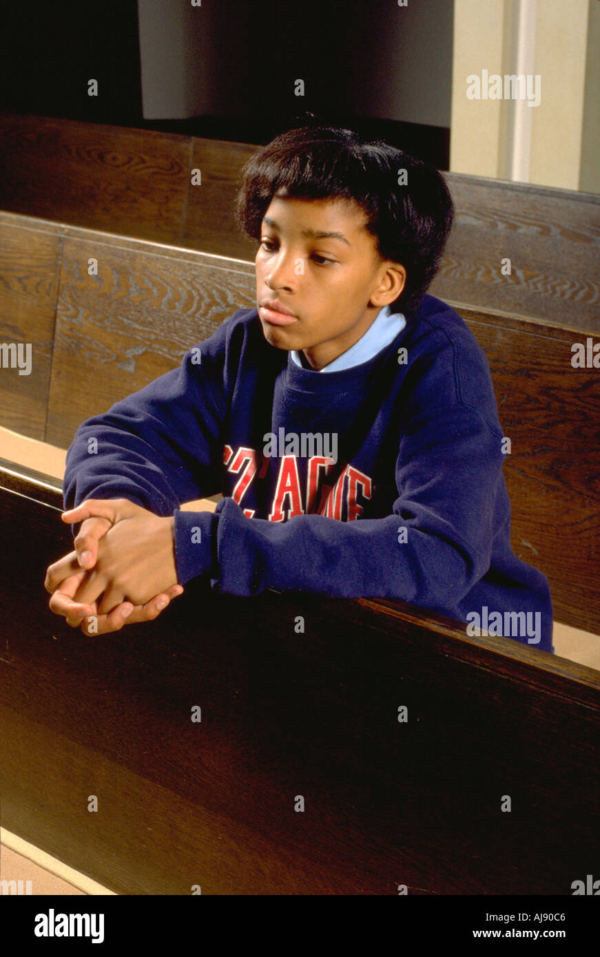 Girl in pew hi-res stock photography and images - Alamy