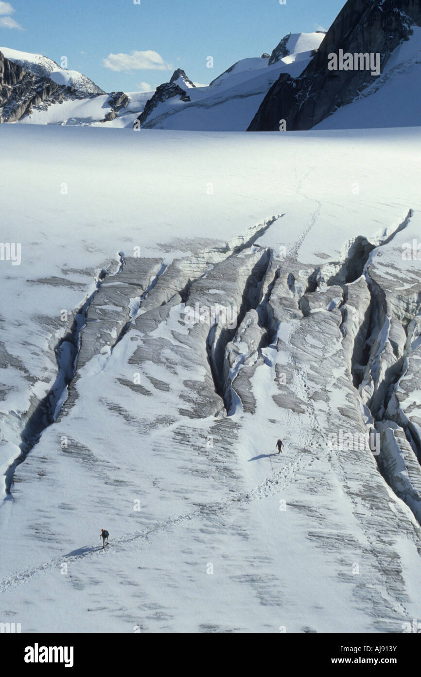 Two climbers walking on glacier Stock Photo - Alamy