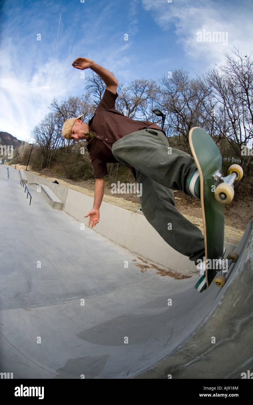 Man skating in skateboard park Stock Photo - Alamy