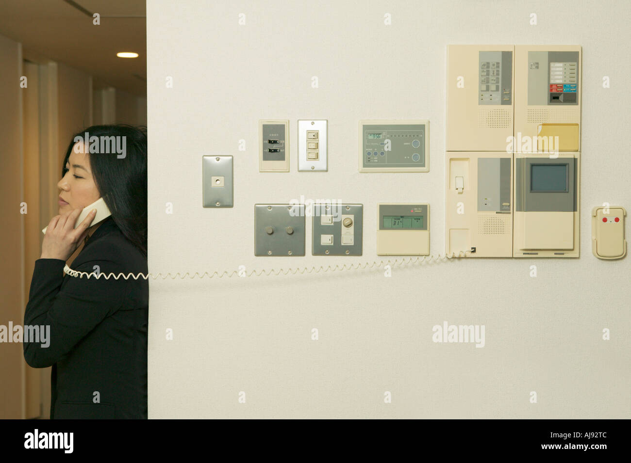 Woman young intercom system hi-res stock photography and images - Alamy