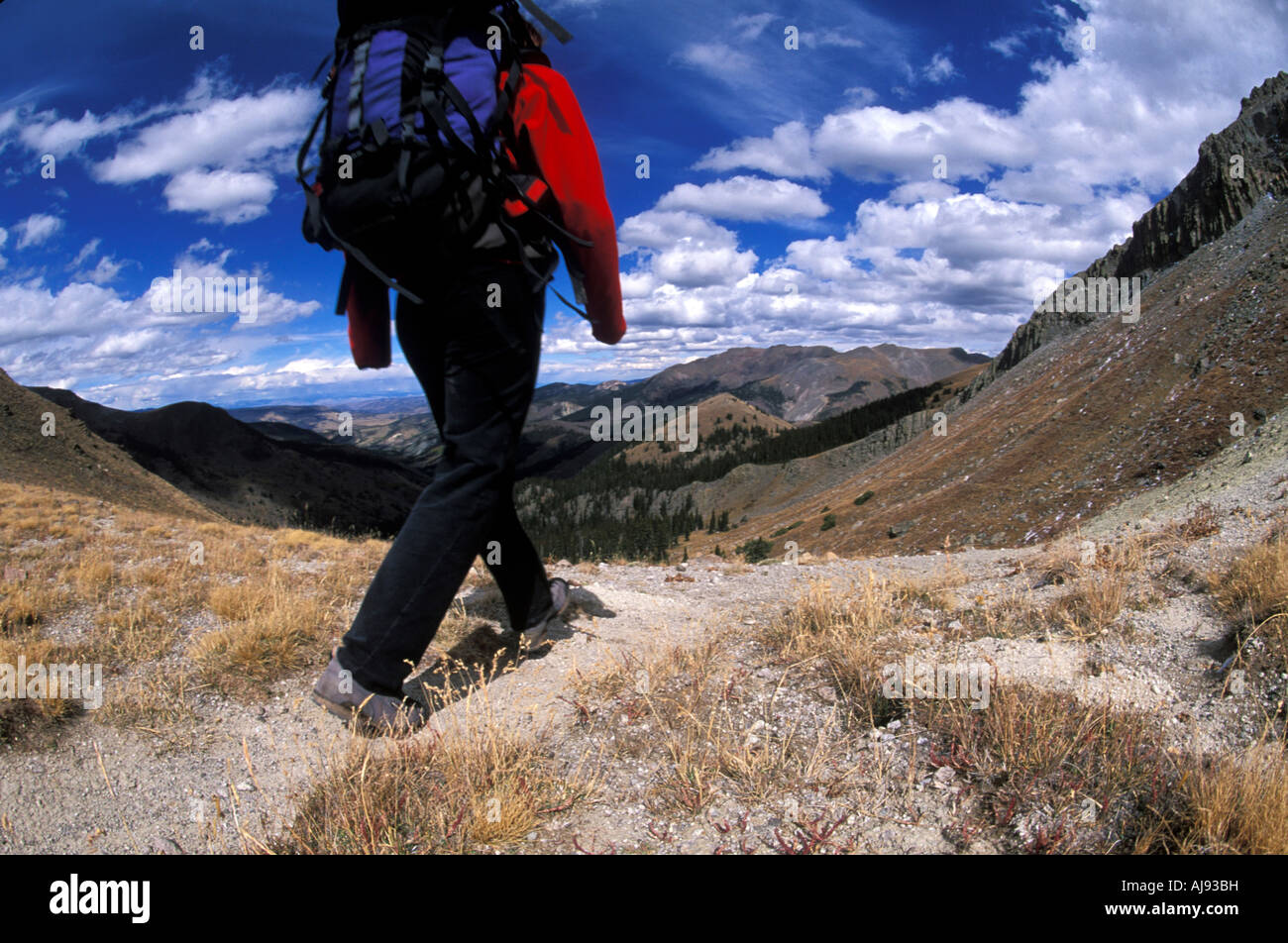 Hiker walking a trail Stock Photo - Alamy