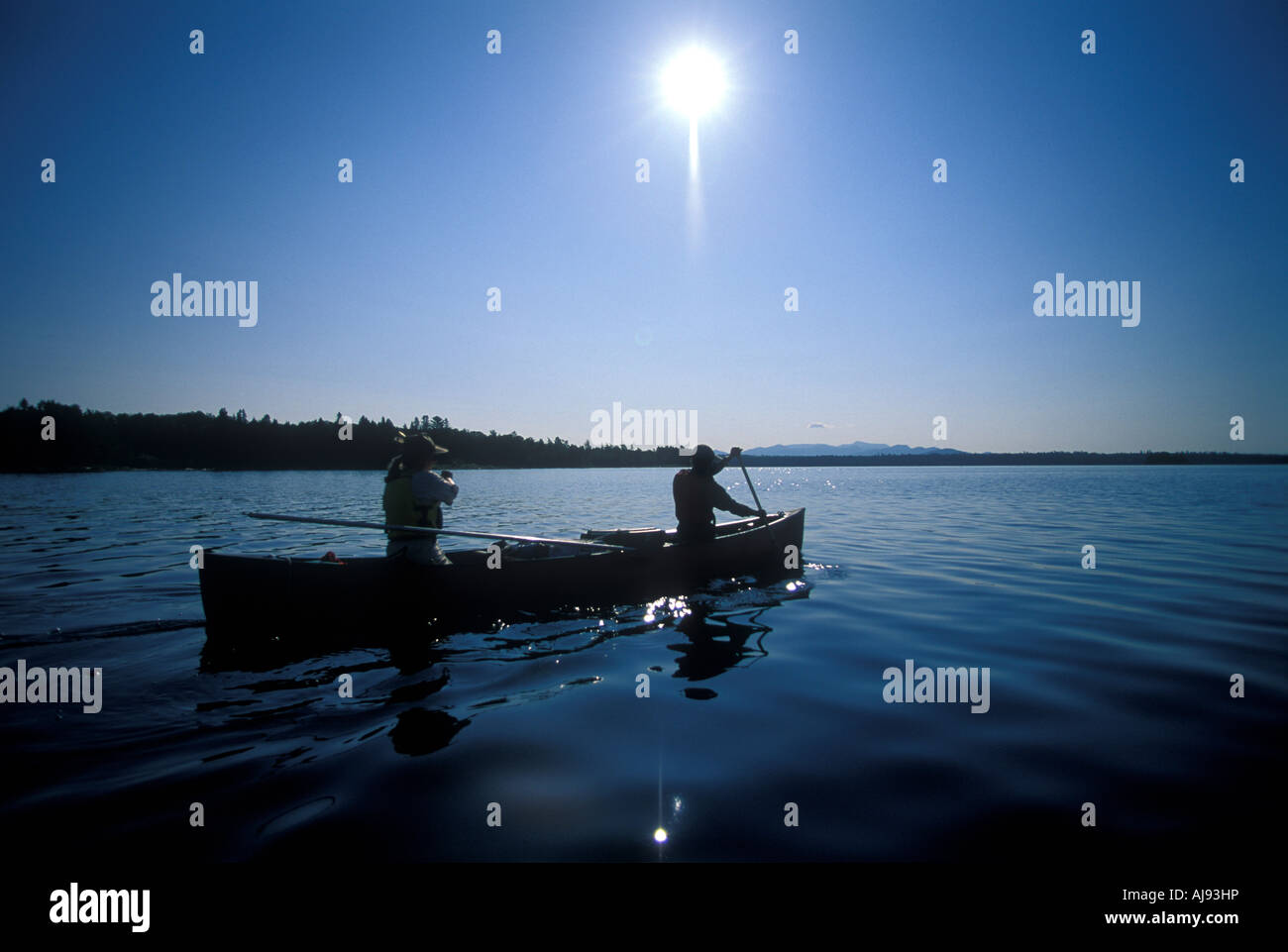 Canoeing on a river Stock Photo - Alamy