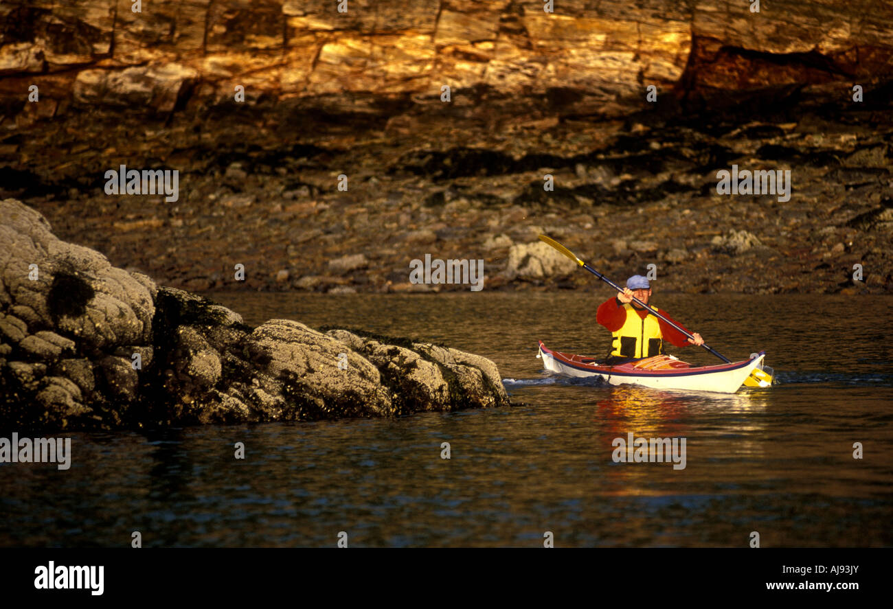 Man sea kayaking Stock Photo - Alamy
