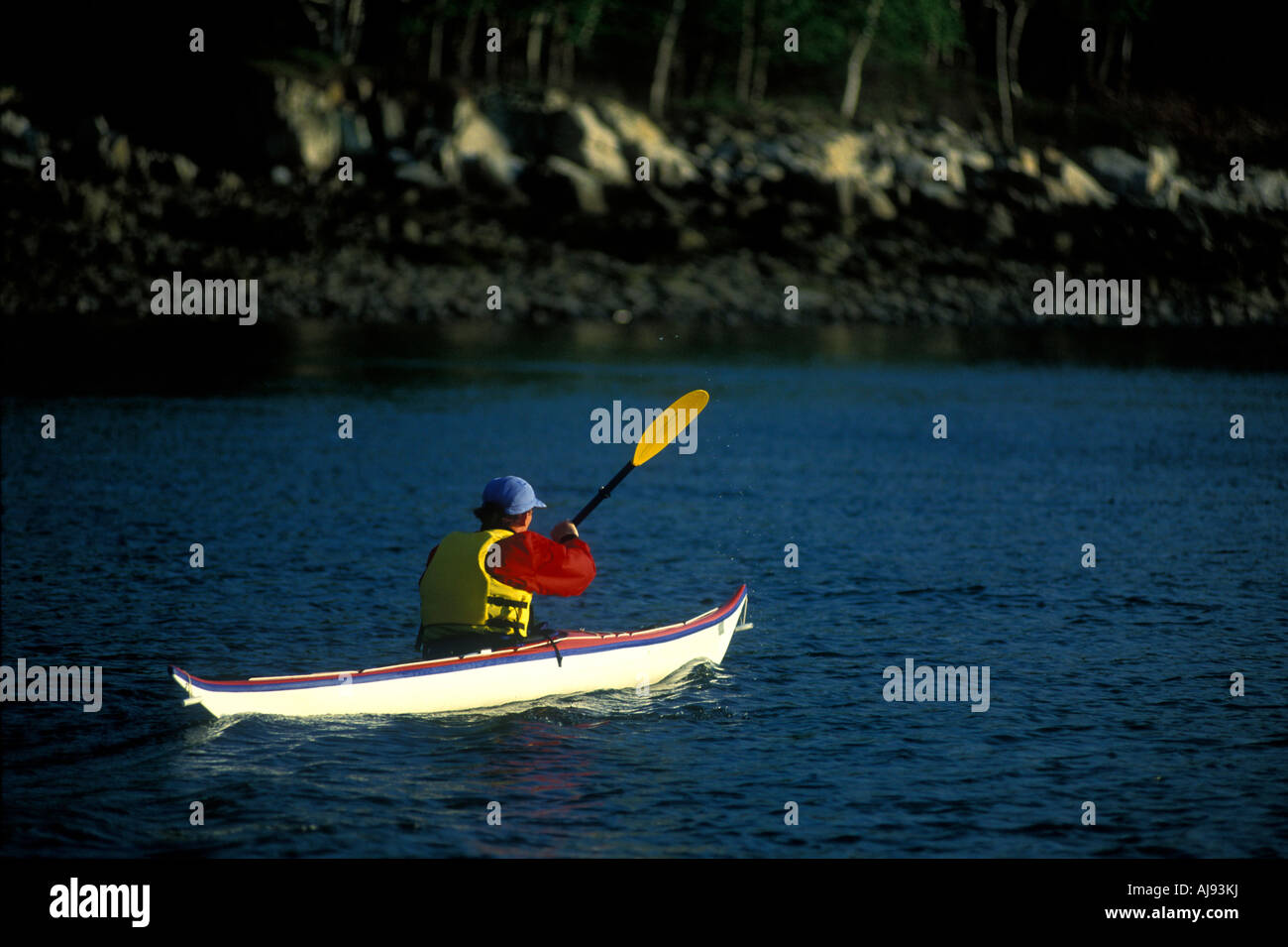 Man sea kayaking Stock Photo - Alamy